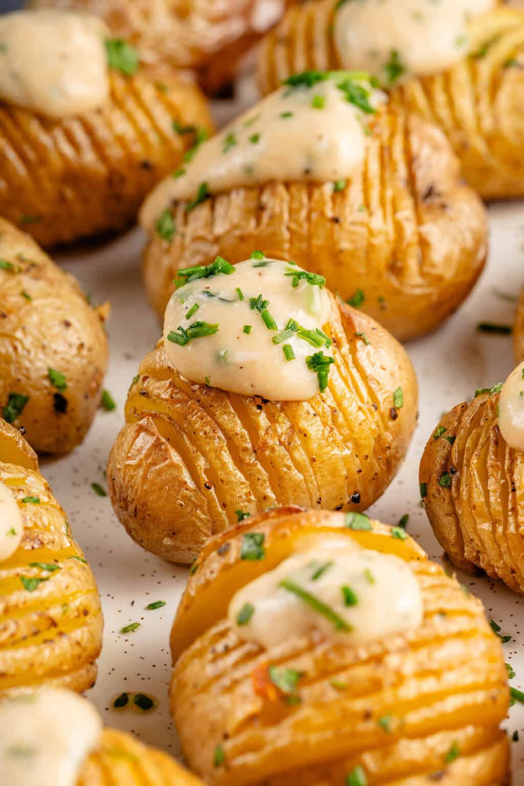 Mini Vegan Sour Cream and Onion Hasselback Potatoes - Sweet Simple Vegan
